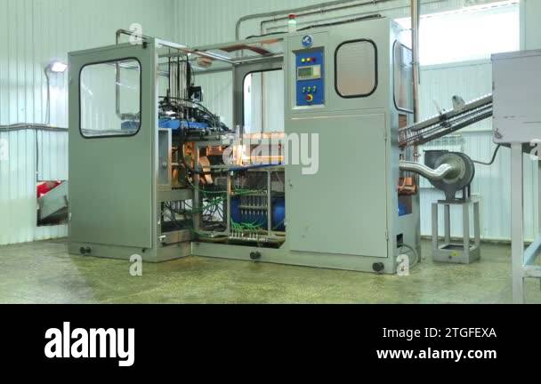 Production of plastic bottles.Automatic system. The production of ...