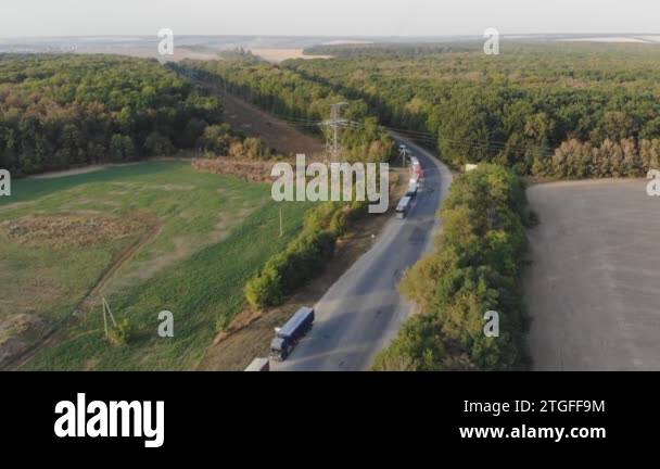 grain delivery. Grain storage. Grain trucks stand along the road in ...