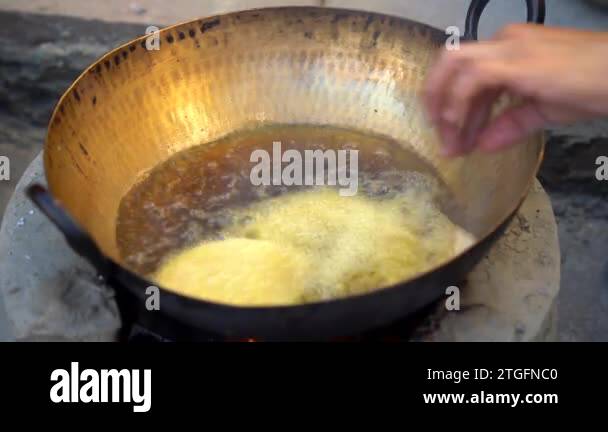 Making of delicious Bengali Luchi (deep fried bread). This is another ...