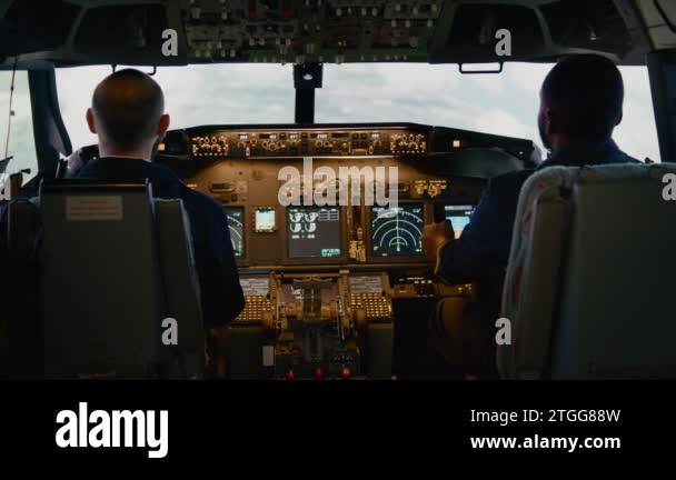 Captain switching buttons to fix altitude and longitude on cockpit ...