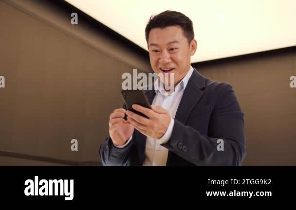 Chinese man in suit Stock Videos & Footage - HD and 4K Video Clips - Alamy