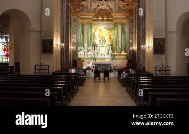 beautiful catholic church interior with wooden benches Stock Video ...