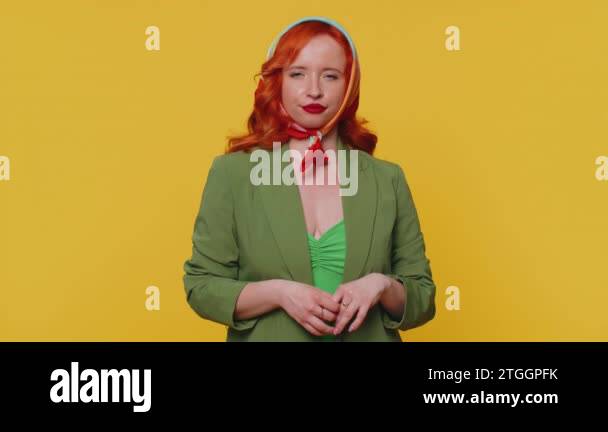 Funny joyful sincere redhead woman 20s in jacket making playful silly ...