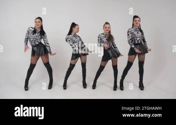 European four girls show teem in short skirts and long hair dancing on ...
