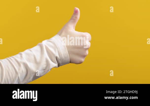 Woman makes hand sign like, thumb up gesture. Correct perfect choice ...