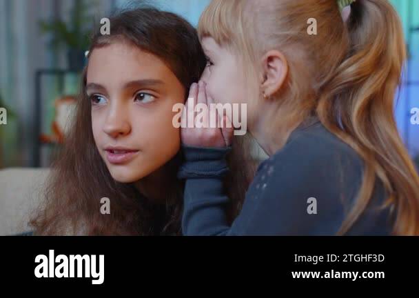 Whisper in friends ear Stock Videos & Footage - HD and 4K Video Clips ...