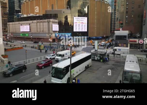 Cars passing road intersection in city, near famous Madison Square ...