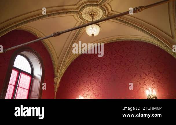 Majestic interior design of hall with high decorated ceiling, hanging ...