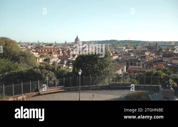 Beautiful Roman city panorama view in daytime, church domes and towers ...