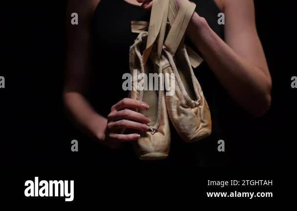 Close-up unrecognizable woman raising hand with pointies hanging on ...