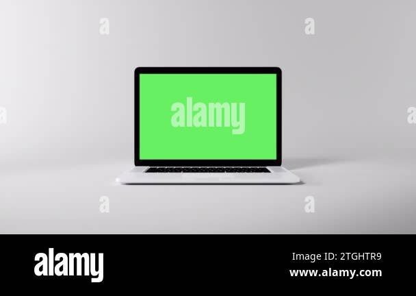 Green Screen Display Laptop Opens and Zoom In on a White Background ...