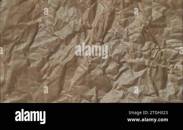 Brown, crumpled paper stop motion animation empty background with free ...