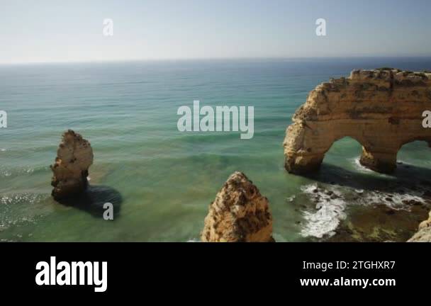 Algarve coast in Portugal offers breathtaking views of coastal features ...