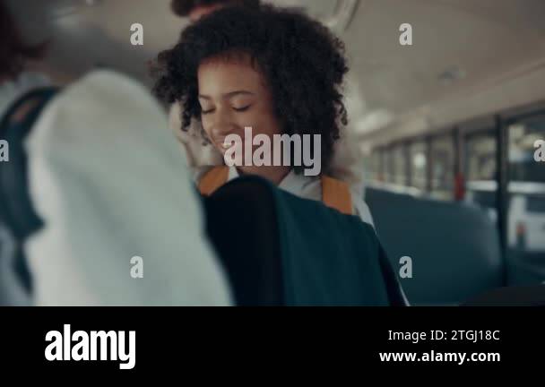 Group children leaving school bus hurrying classes sunny morning close up. Happy preadolescent ...