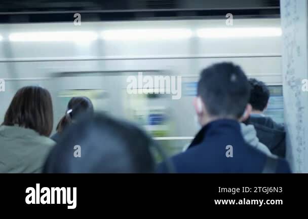 Tokyo queue subway Stock Videos & Footage - HD and 4K Video Clips - Alamy
