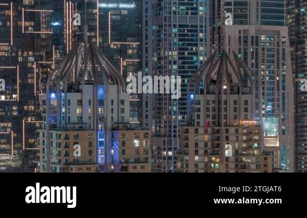 Windows in high-rise skyscrapers exterior in the late evening with ...