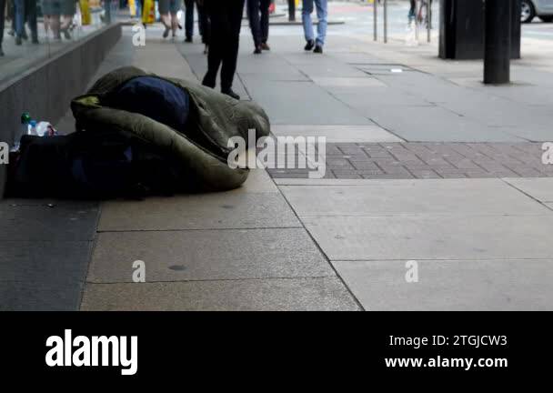 Homeless person rough sleeping Stock Videos & Footage - HD and 4K Video ...