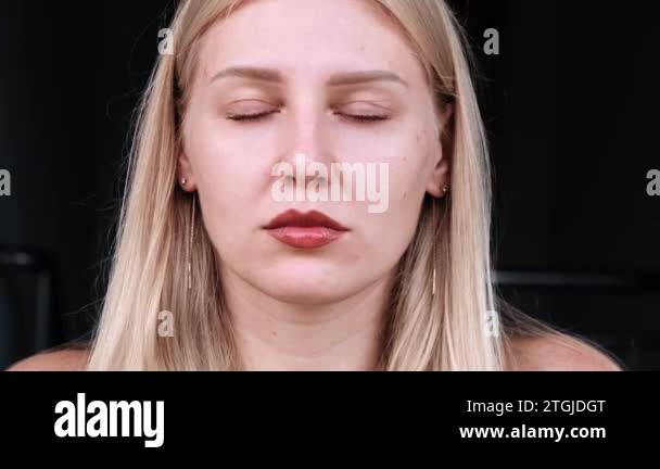 Emotion of sadness, sadness and disappointment. Headshot of a young ...