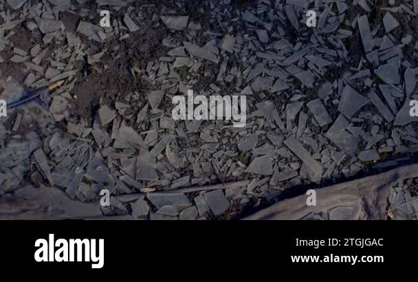 Broken glass on the floor in an emergency building. Dangerous place at ...