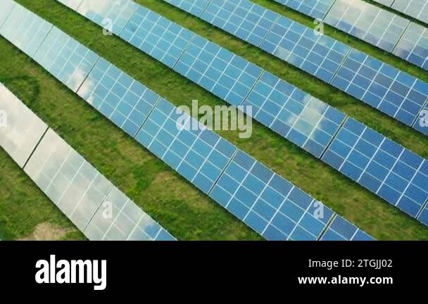 Modern solar station with photovoltaic sun panels installed in field ...