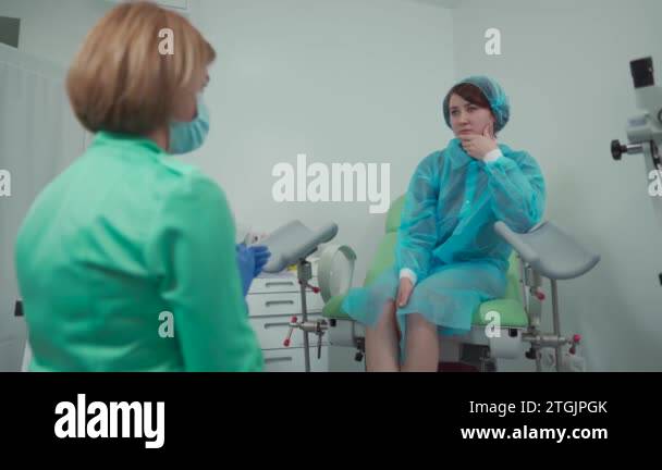 Female conversing with her gynecologist during consultation. Woman ...