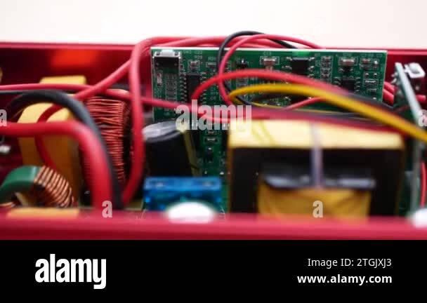 The internal structure of the voltage converter. The electronic ...