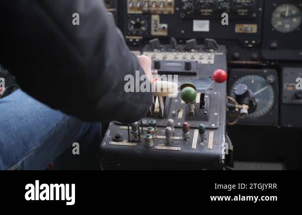 Pilot push thrust lever handle for takeoff a old plane in the cockpit ...