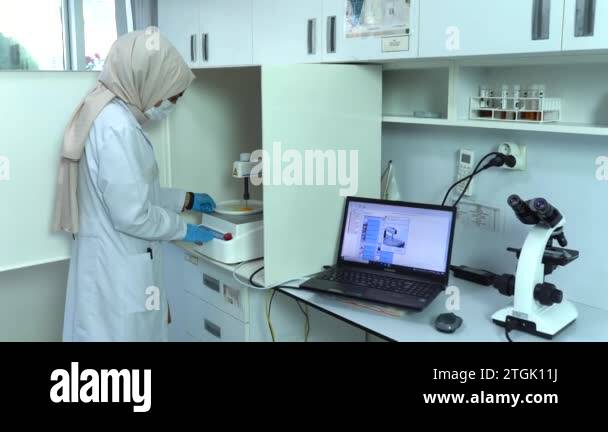 Quality control specialist inspection on food sample in laboratory ...