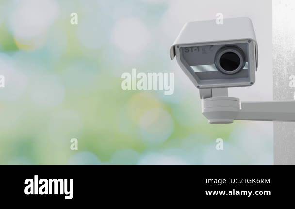 CCTV camera security installed on wall of the building. Scan the area ...