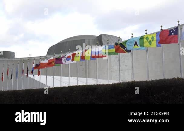 Flags in front of United Nations building in New York City. Flags ...