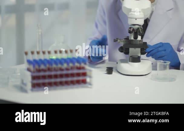 Medical research scientist testing vaccine experimental drug in ...