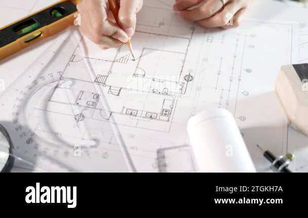 Architectural project workspace. Top view of architect drawing with ...