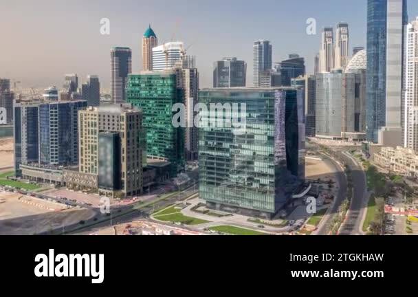 Business Bay Dubai skyscrapers with construction site and road traffic ...