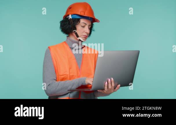Female civil engineer reviewing future of real estate development ...