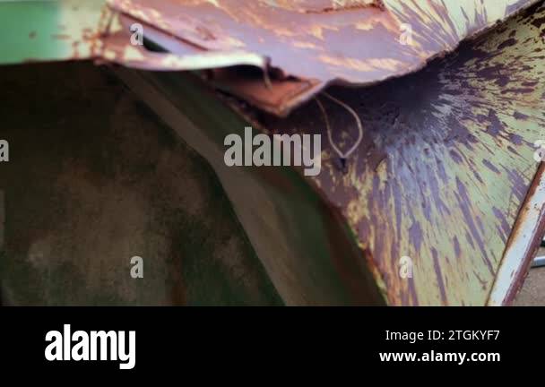 Hole or hole, armor deformation from a projectile close-up. Damaged ...