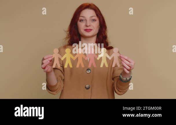 Woman showing multiracial different skin color human shape cut out of ...