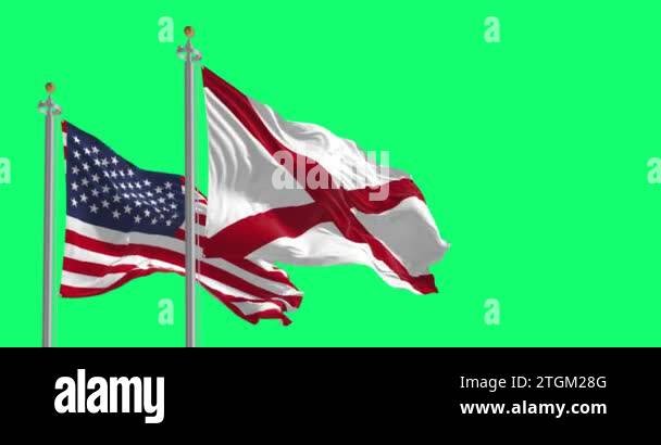 The flags of Alabama and US waving isolated on a green background ...