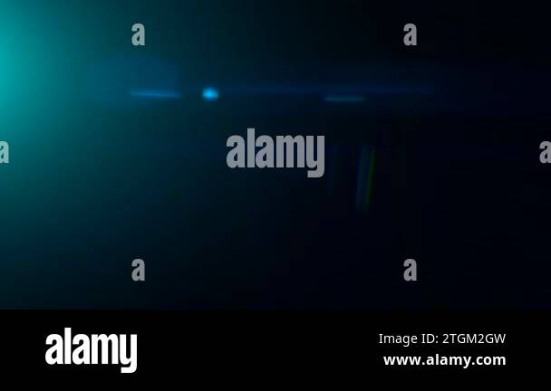 Anamorphic lens flare with blue tint highlights left side of frame ...