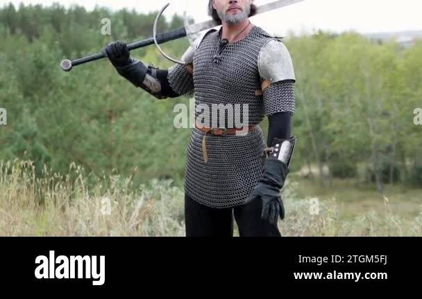 Portrait of a medieval warrior with gray hair and a scar on his face in ...