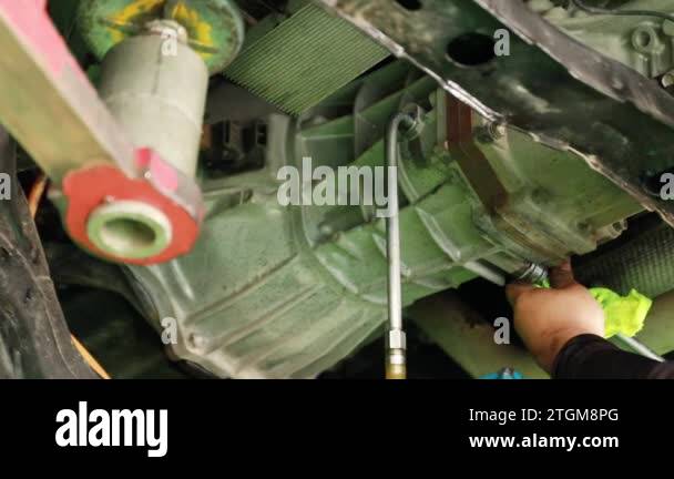 Car maintenance : Mechanic professional repairs the diesel pick-up ...