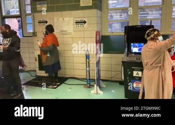 This video shows African American people inside the polling station ...