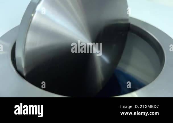 The iron lid of the bucket wobbles after That something was thrown at ...