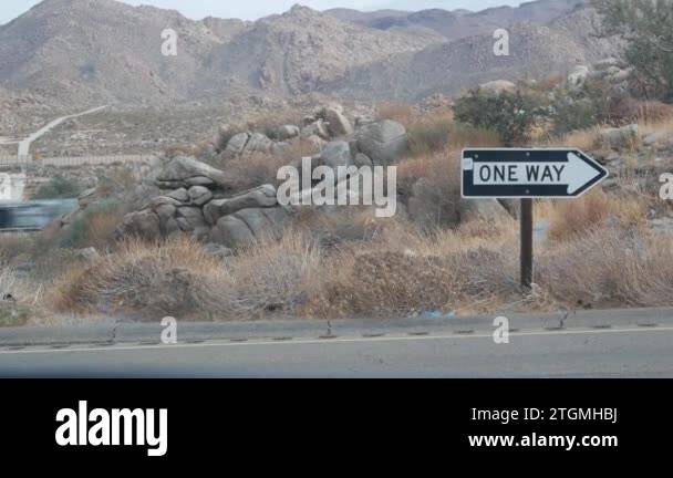 One way road transport sign with arrow on roadside or wayside, highway ...