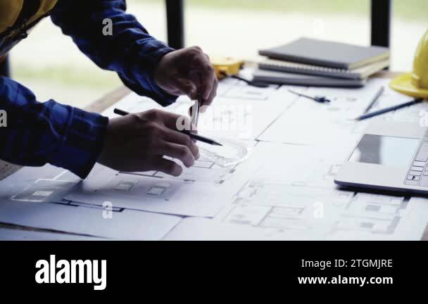 Architectural Project Workplace Engineer drafts construction project ...