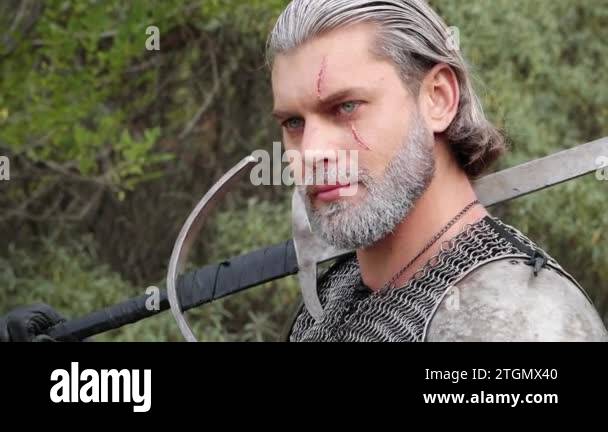 Portrait of a medieval warrior with gray hair and a scar on his face in ...