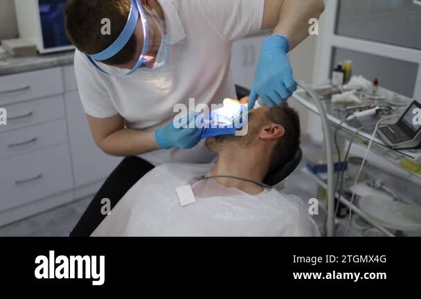 Tooth pain and dentistry concept. real treatment. reportage. the ...