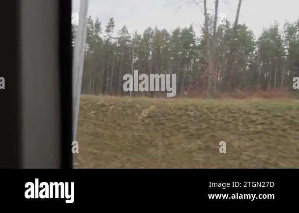 View on railroad track from the window of fast train. 4K Interior view ...