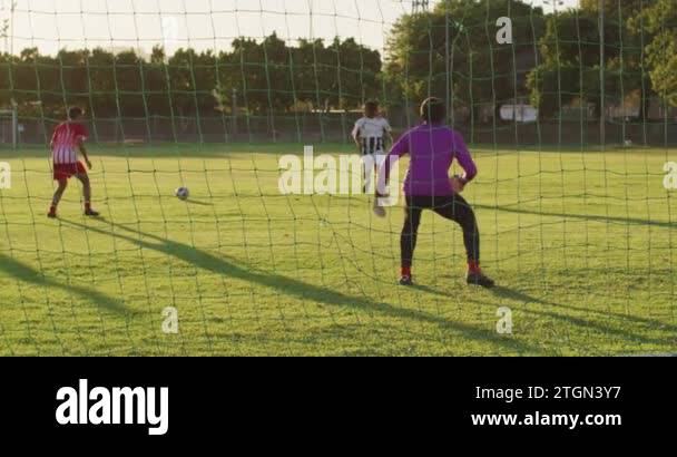 Video of diverse gorup of male football players on field,playing ...