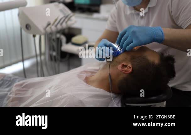 Tooth pain and dentistry concept. real treatment. reportage. the ...