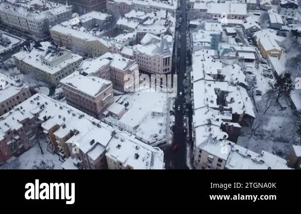 superb view from a height of the snow-covered old town. Cold weather ...